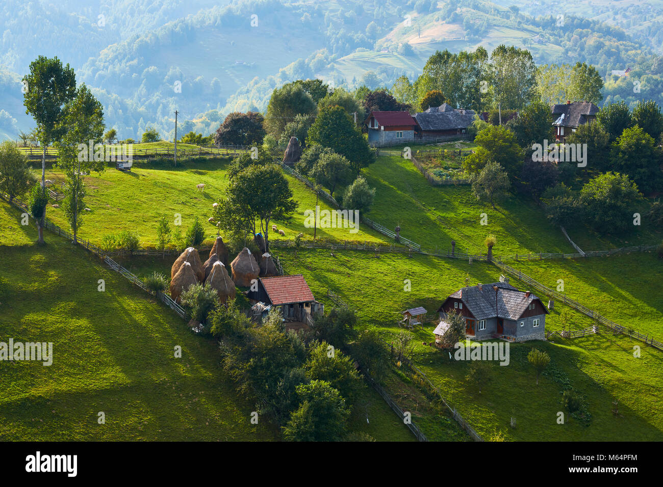 Springtime rural scenery in a traditional Transylvanian hamlet on top ...