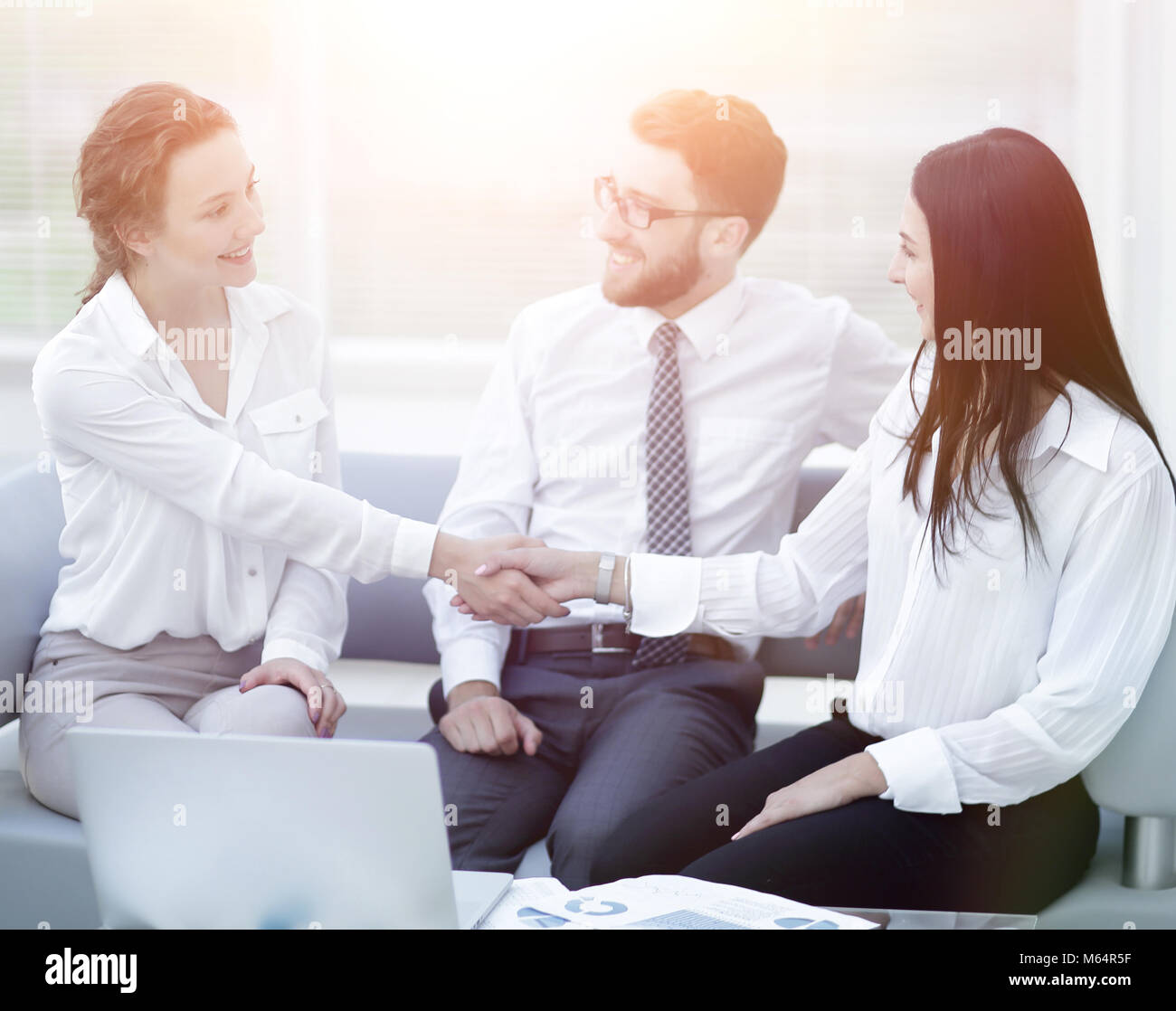 handshake of manager and client in the office lobby Stock Photo - Alamy