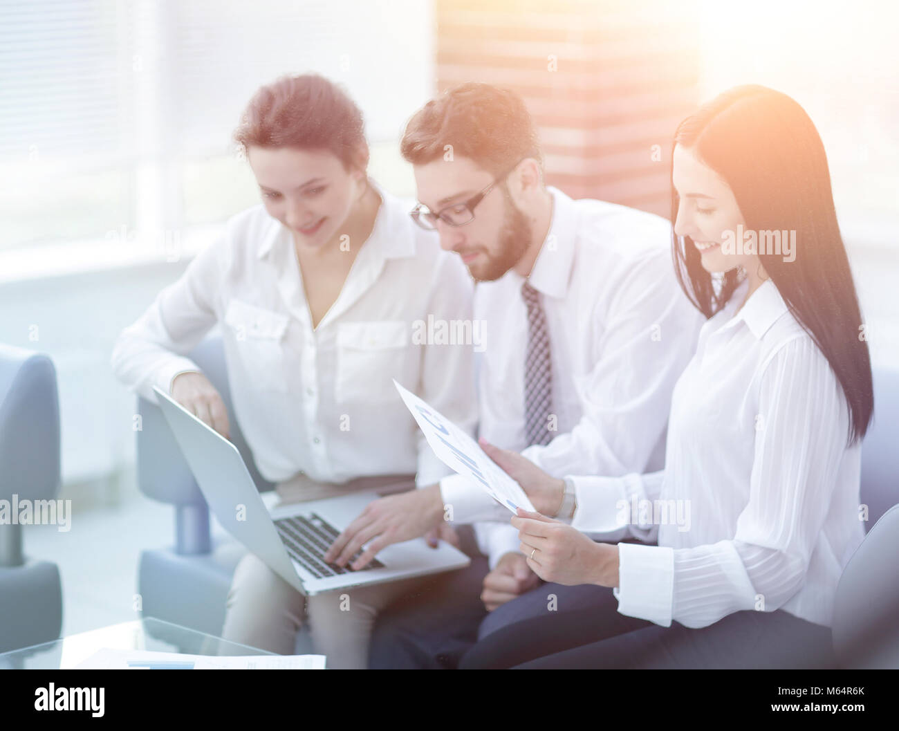 business team working with financial charts in the office Stock Photo ...