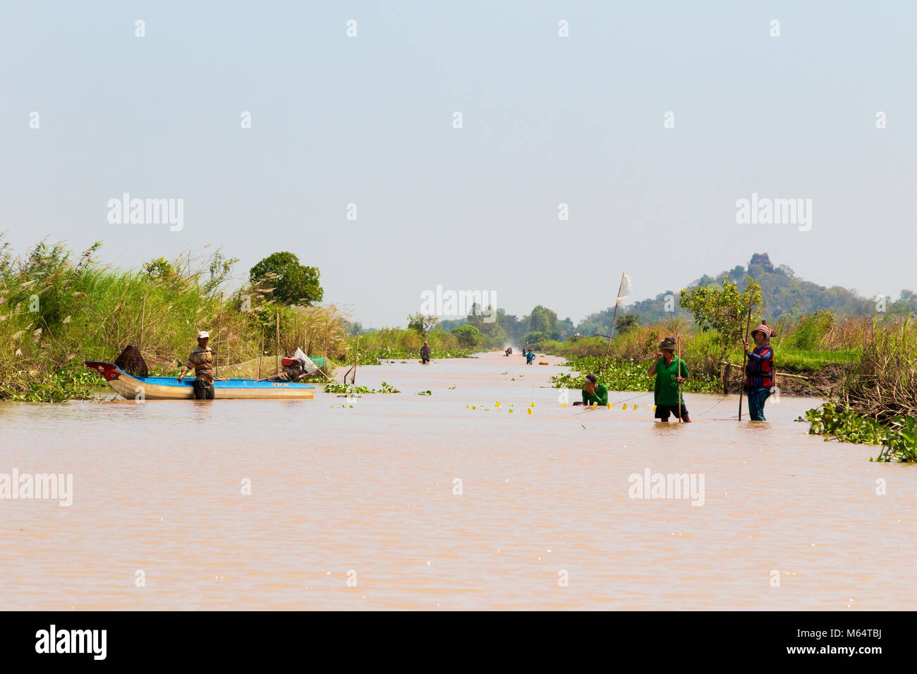 Cambodia - Local Cambodian people fishing in the canals of the southern ...