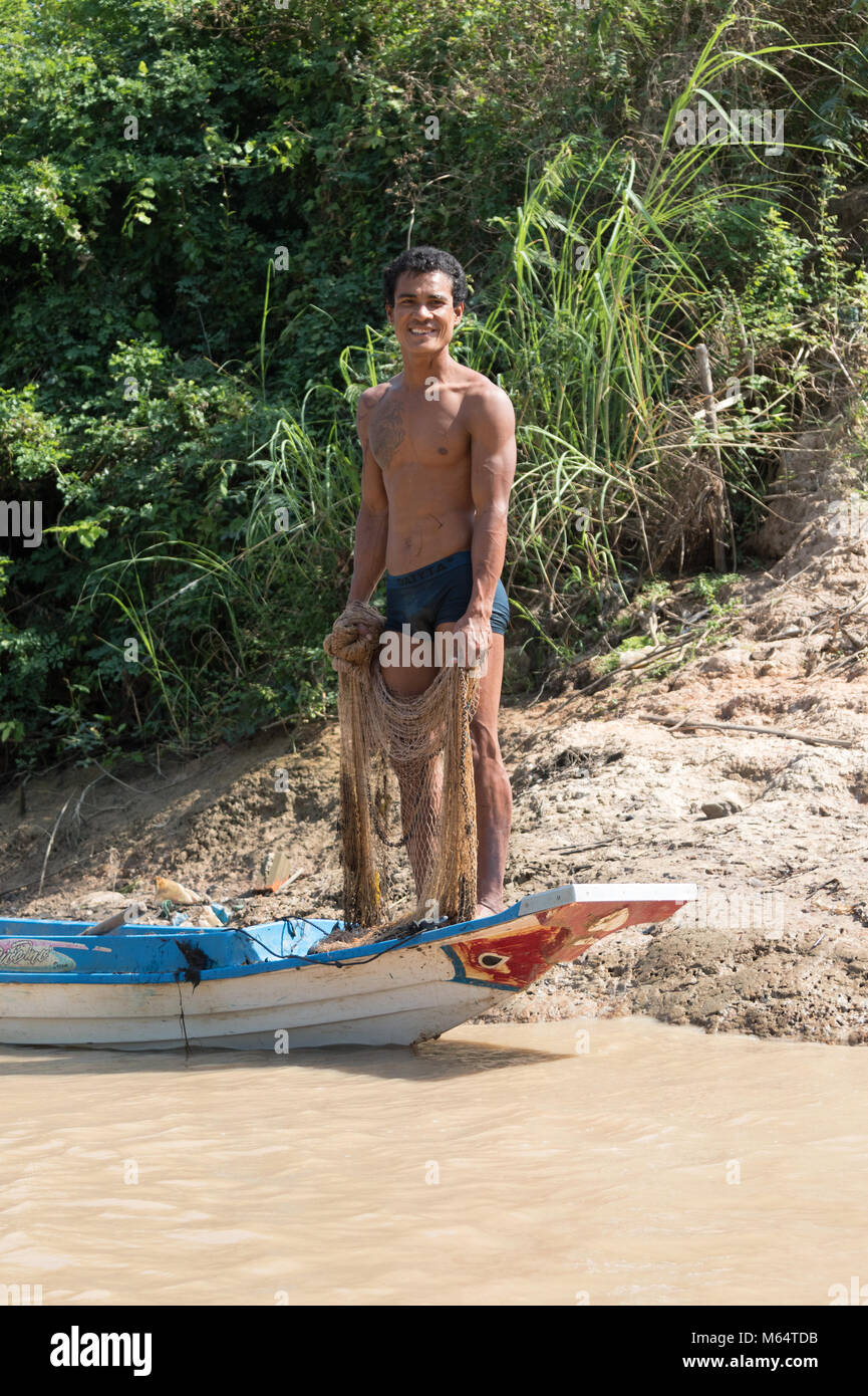 Cambodia fisherman fishing on the canals in the southern countryside ...