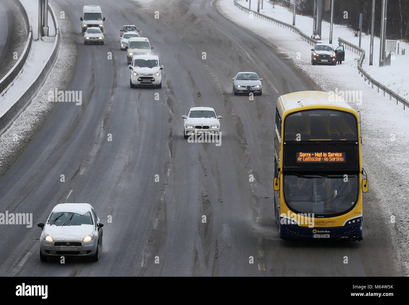 A bus displaying 'Sorry - Not in Service' drives on the M50 in Dublin ...