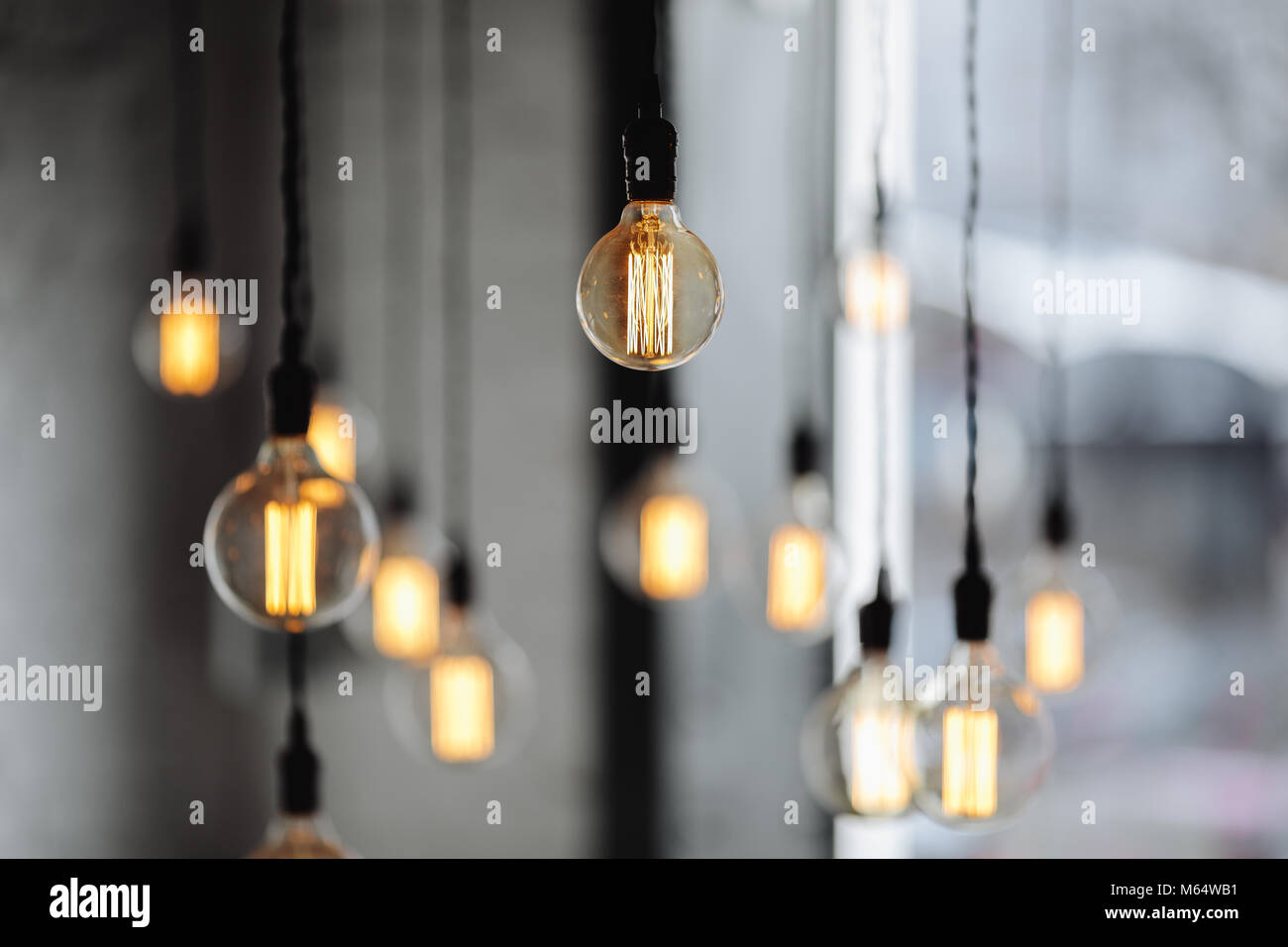 Lamps on the coffee place with blur background Stock Photo - Alamy