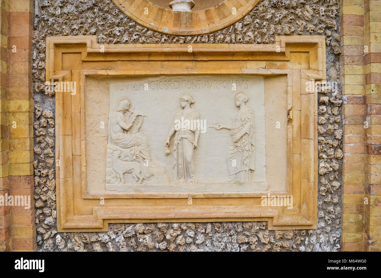 ROME, ITALY - SEPTEMBER 26, 2017: Ancient sculpture paintings on wall ...