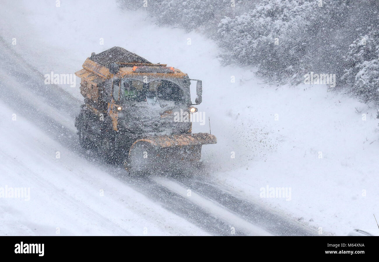 A snow plough on the M876 near Falkirk in heavy snow, as snow and sub ...