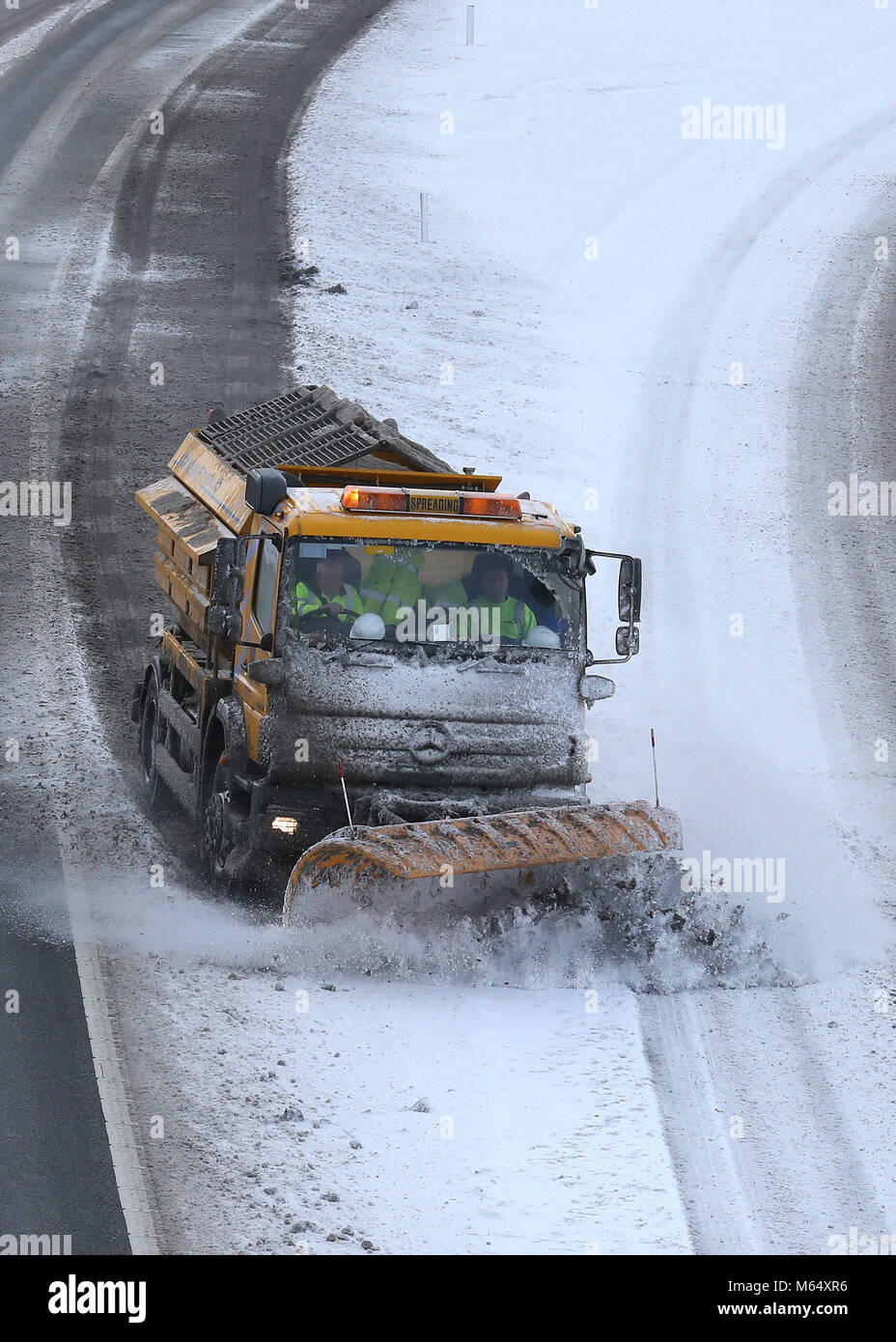 A snow plough on the M9 near Falkirk, as snow and sub-zero conditions ...