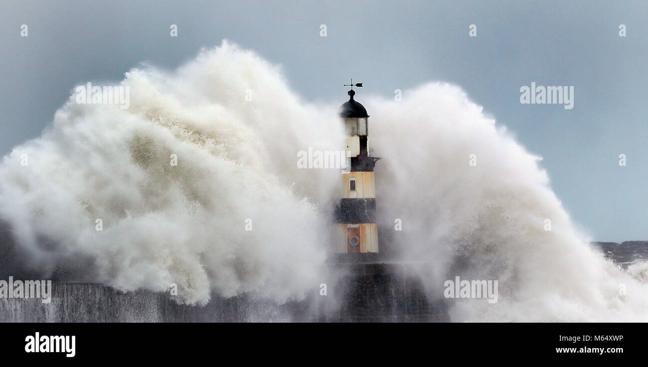 Giant waves crash over Seaham lighthouse near Durham as the "Beast from ...
