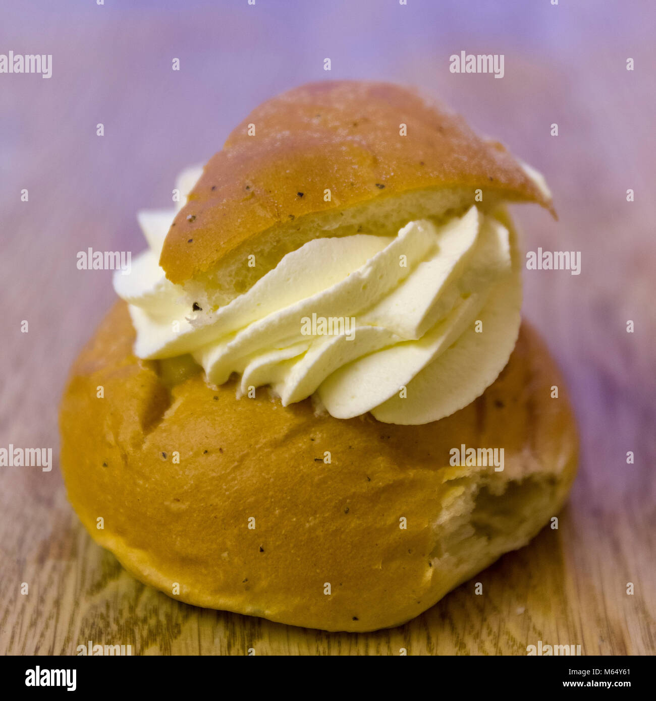 Swedish Semla – a small, wheat flour bun, flavoured with cardamom and ...