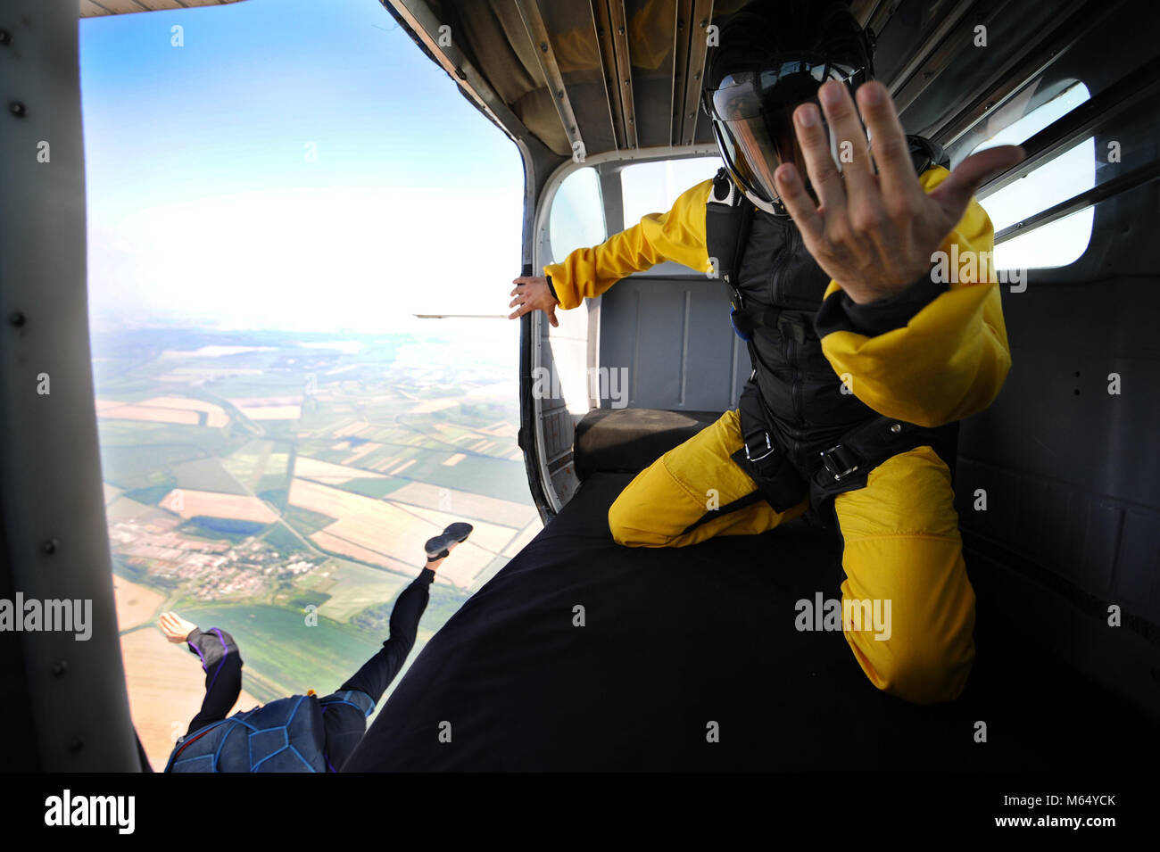 Parachutist in the airplane before jump on sunny day Stock Photo - Alamy