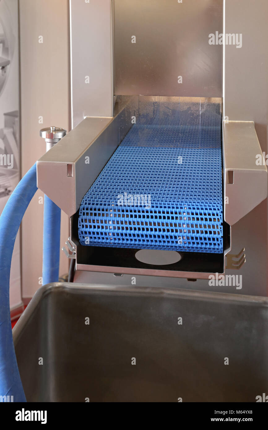 Blue Plastic Conveyor Belt at Production Line Machine Stock Photo - Alamy