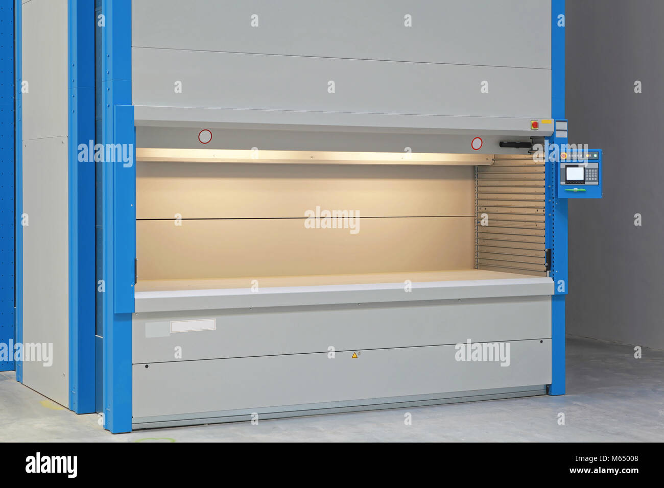 Automated Carousel Storage in Distribution Warehouse Stock Photo - Alamy