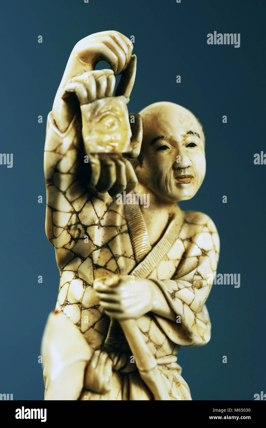Small beautiful isolated shiny decorative porcelain figure Stock Photo ...