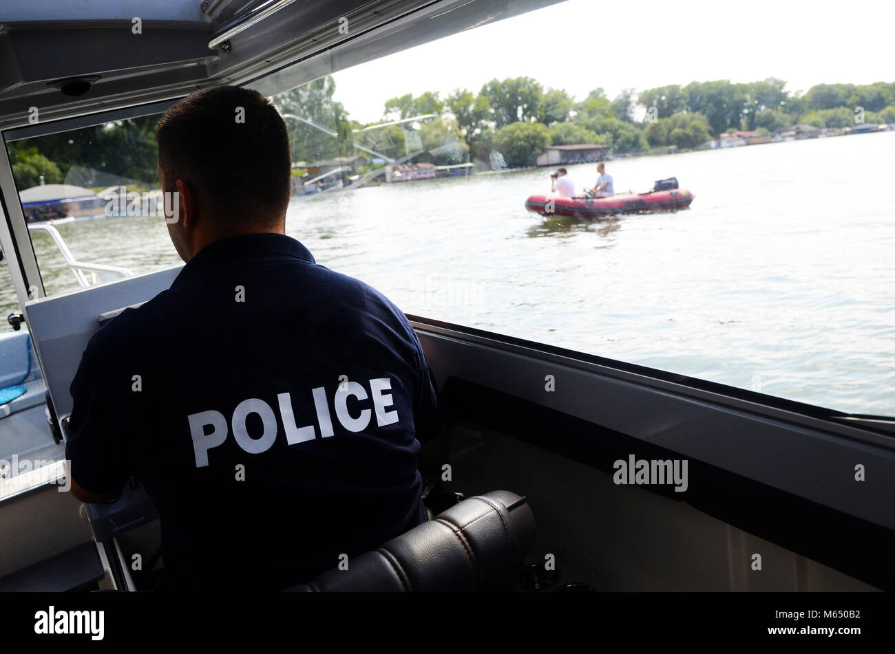 River police in summer day patrol action Stock Photo - Alamy