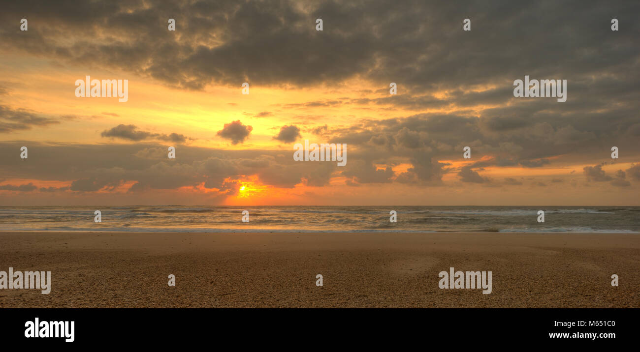 Lonely beach at sunset, panoramic view Stock Photo - Alamy