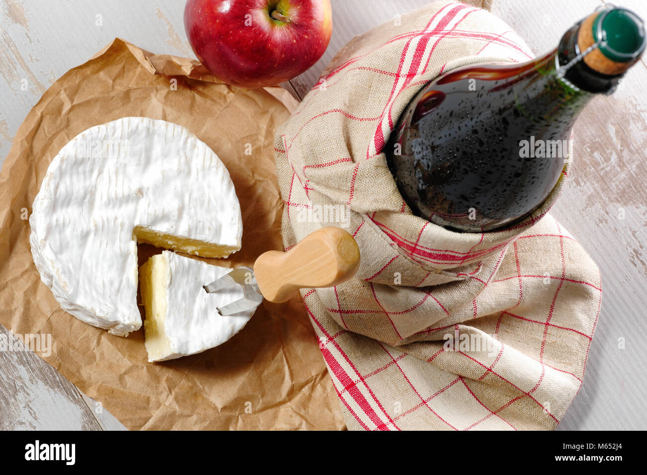 Camembert and a cider bottle from Normandy or Bretagne Stock Photo - Alamy