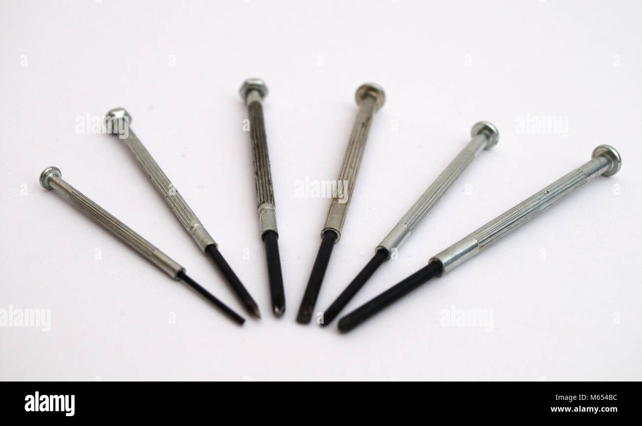 Six screwdrivers rigged in some form on a white background Stock Photo ...