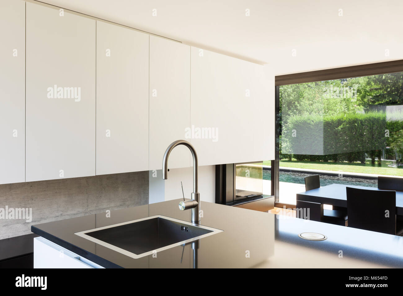 Modern villa, interior, view room from kitchen Stock Photo - Alamy