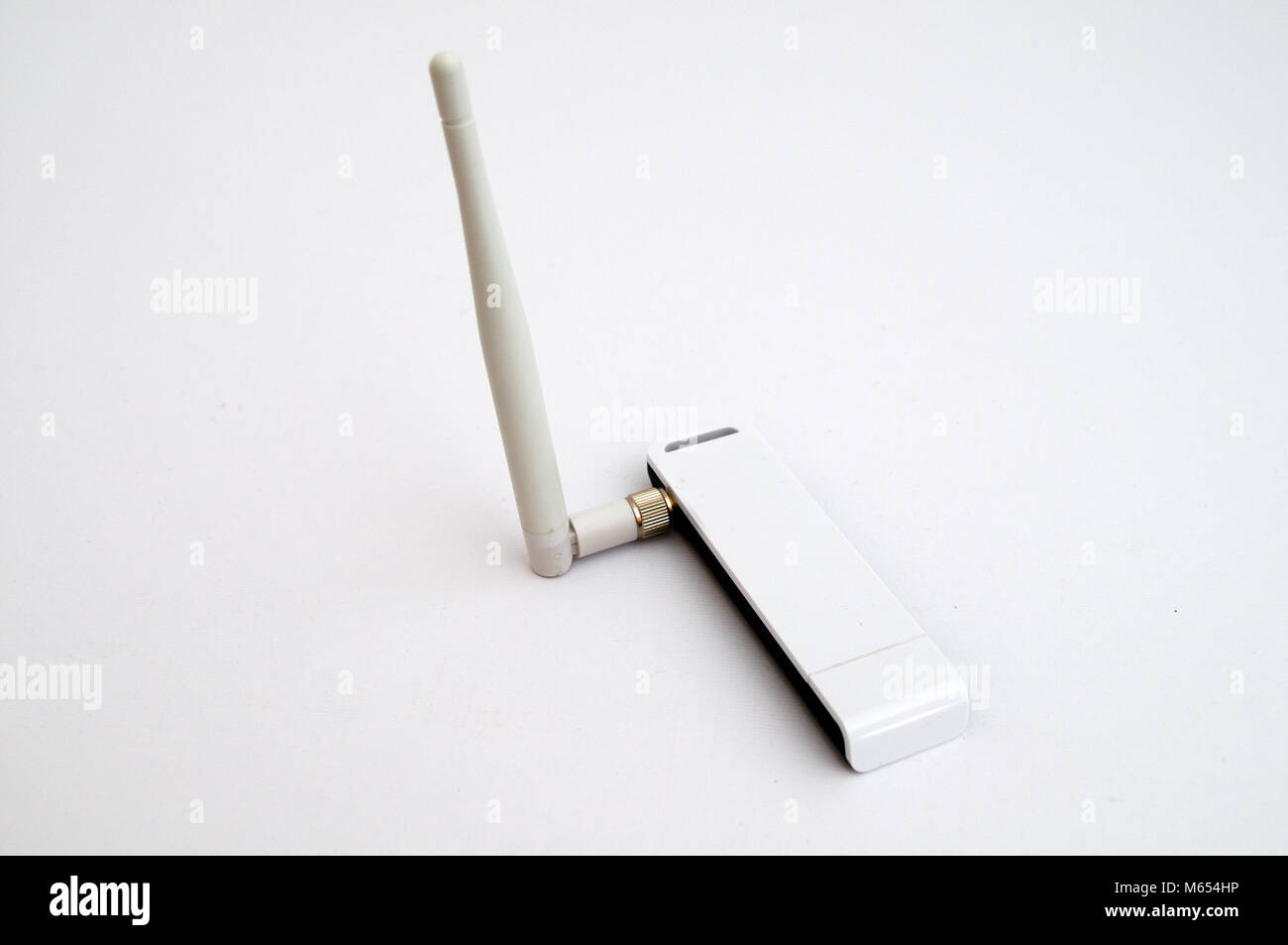 White internet adapter on a white background Stock Photo - Alamy
