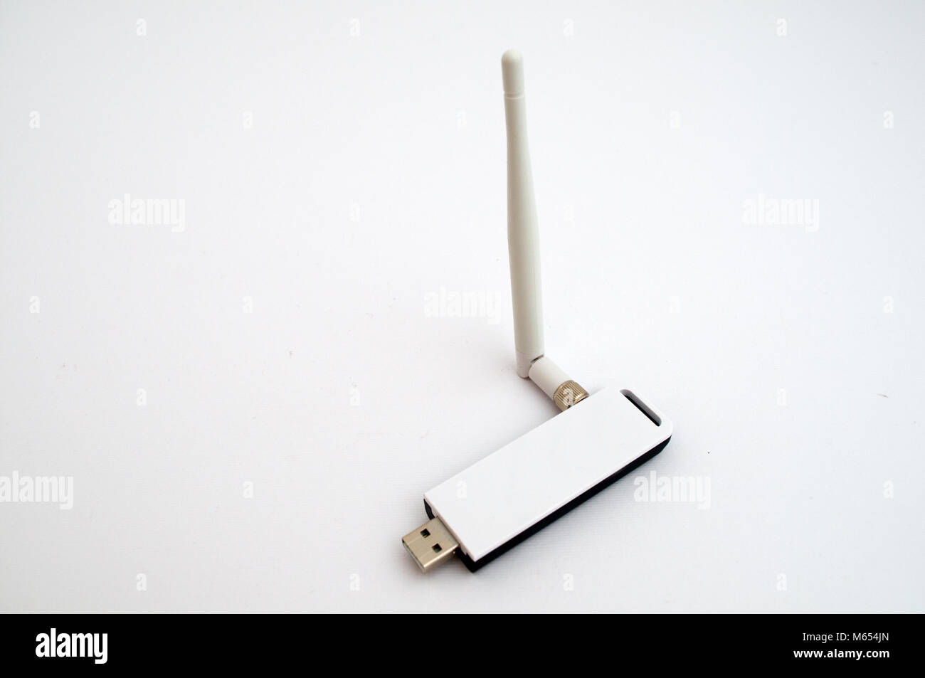 White internet adapter on a white background Stock Photo - Alamy
