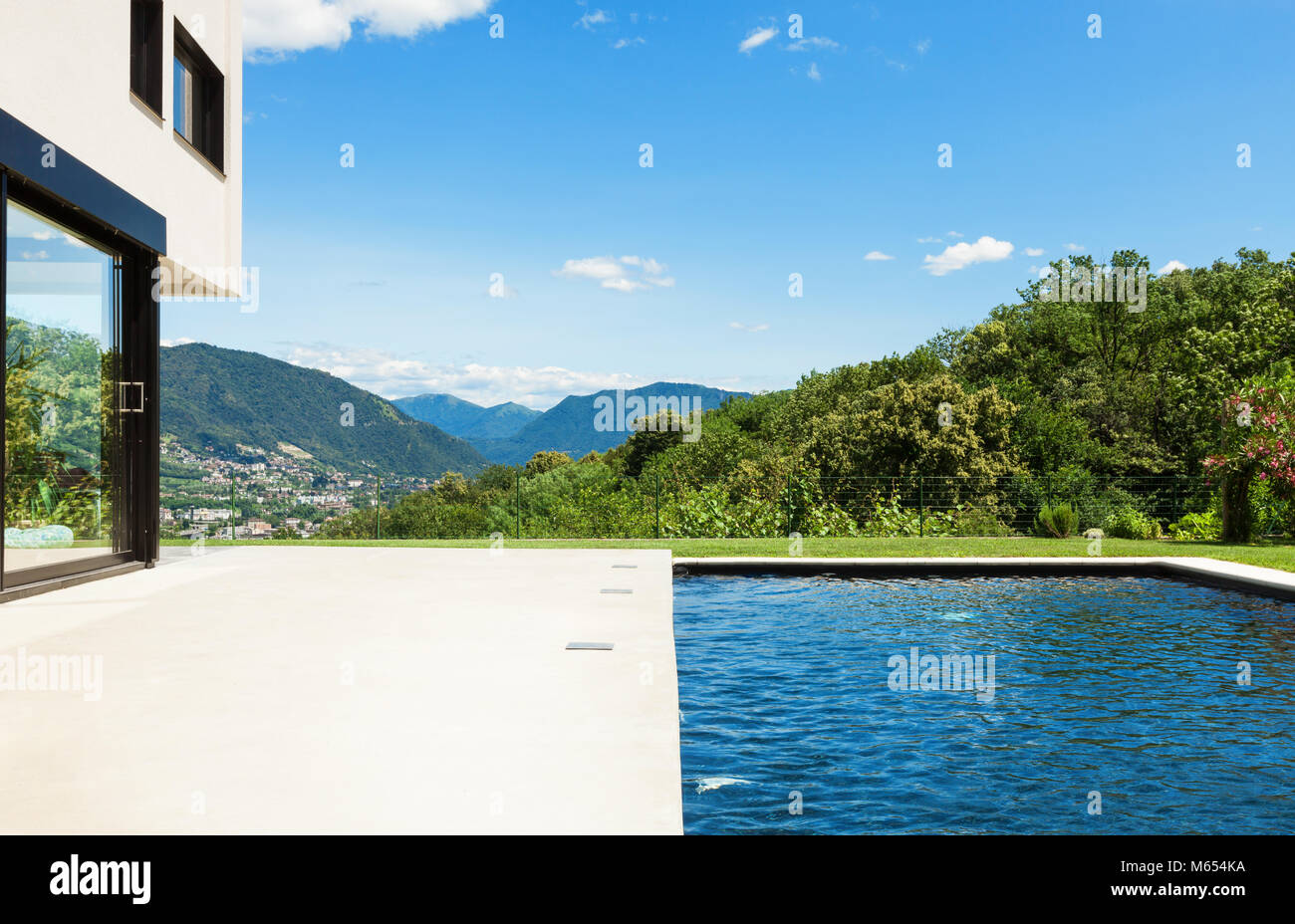 Modern villa , outdoor, view from poolside Stock Photo - Alamy