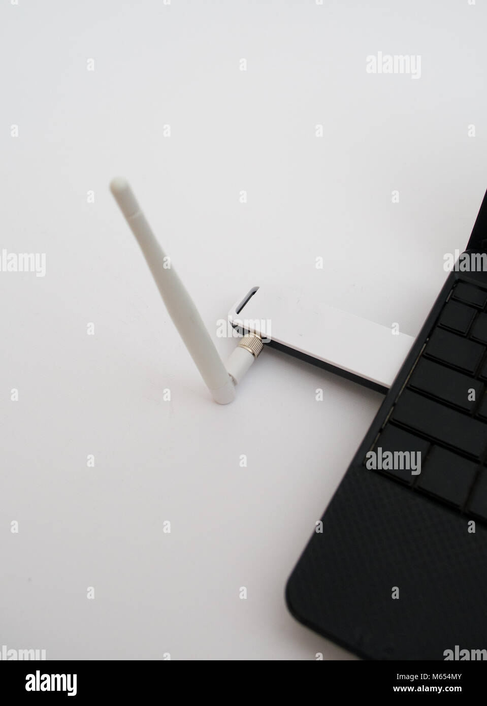 White internet adapter on a white background Stock Photo - Alamy