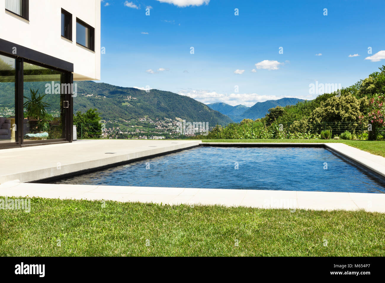 Modern villa , outdoor, view from poolside Stock Photo - Alamy