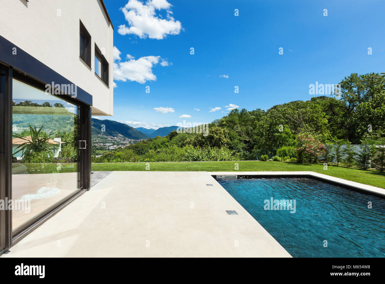 Modern villa , outdoor, view from poolside Stock Photo - Alamy