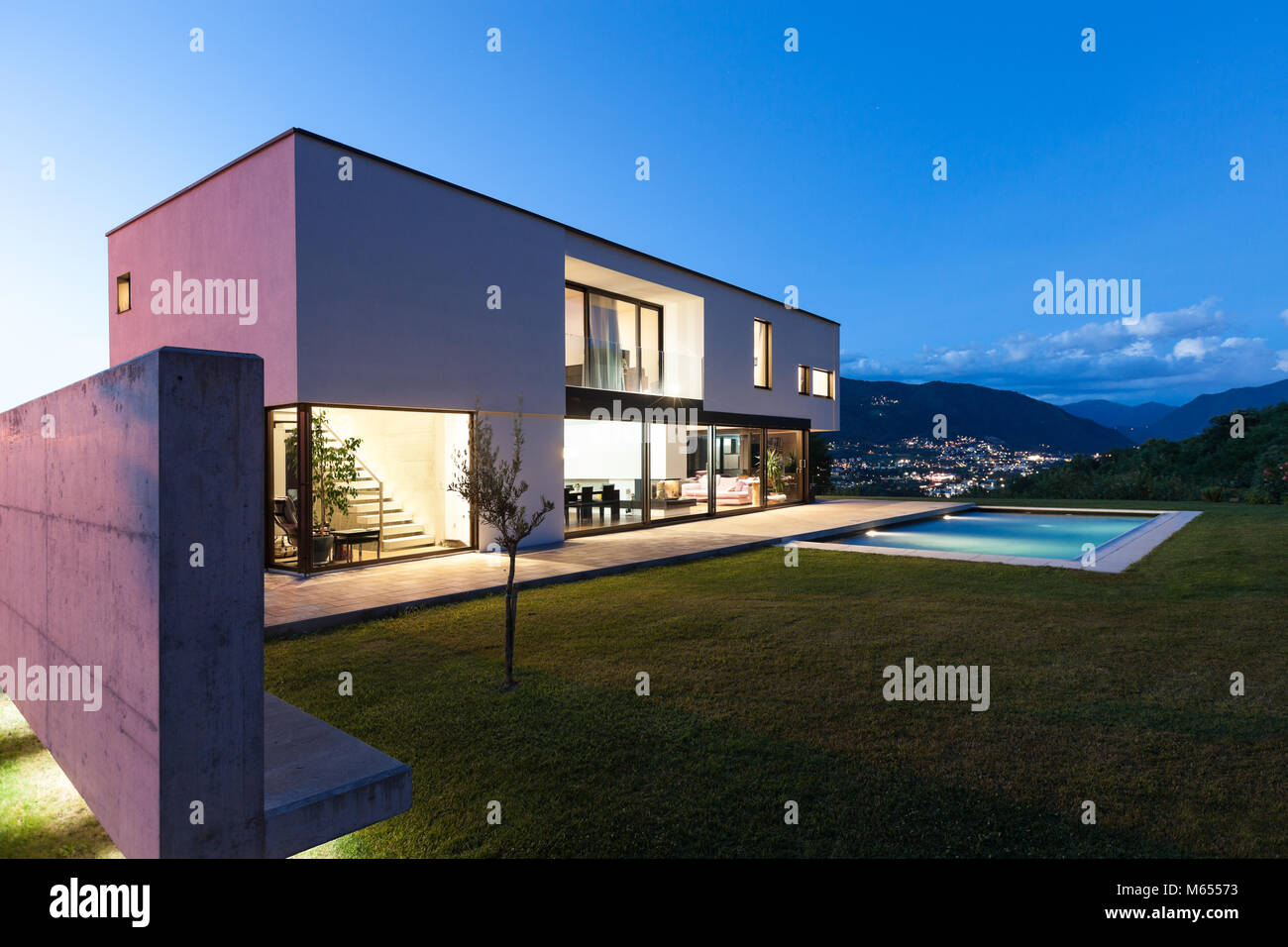 Modern villa with pool, night scene Stock Photo - Alamy
