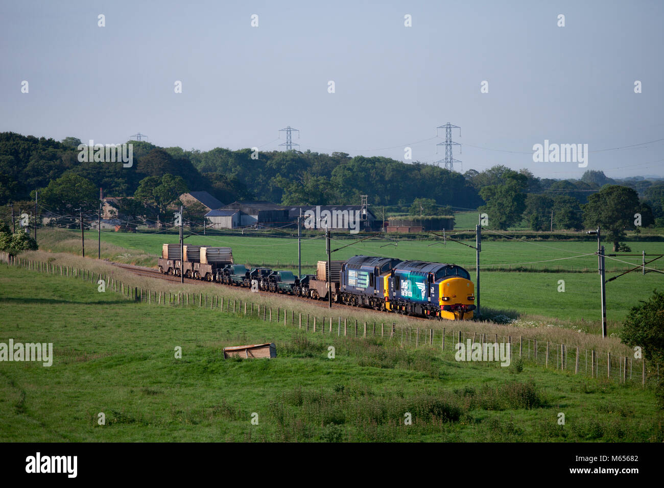 2 Direct rail Services class 37 locomotives pass Scorton (south of ...