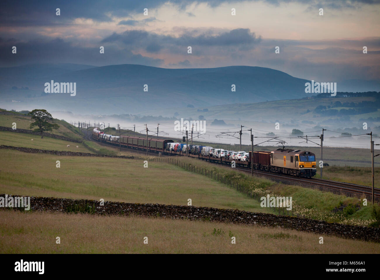 A DB Cargo class 92 electric locomotive passes Salterwath climbing Shap ...