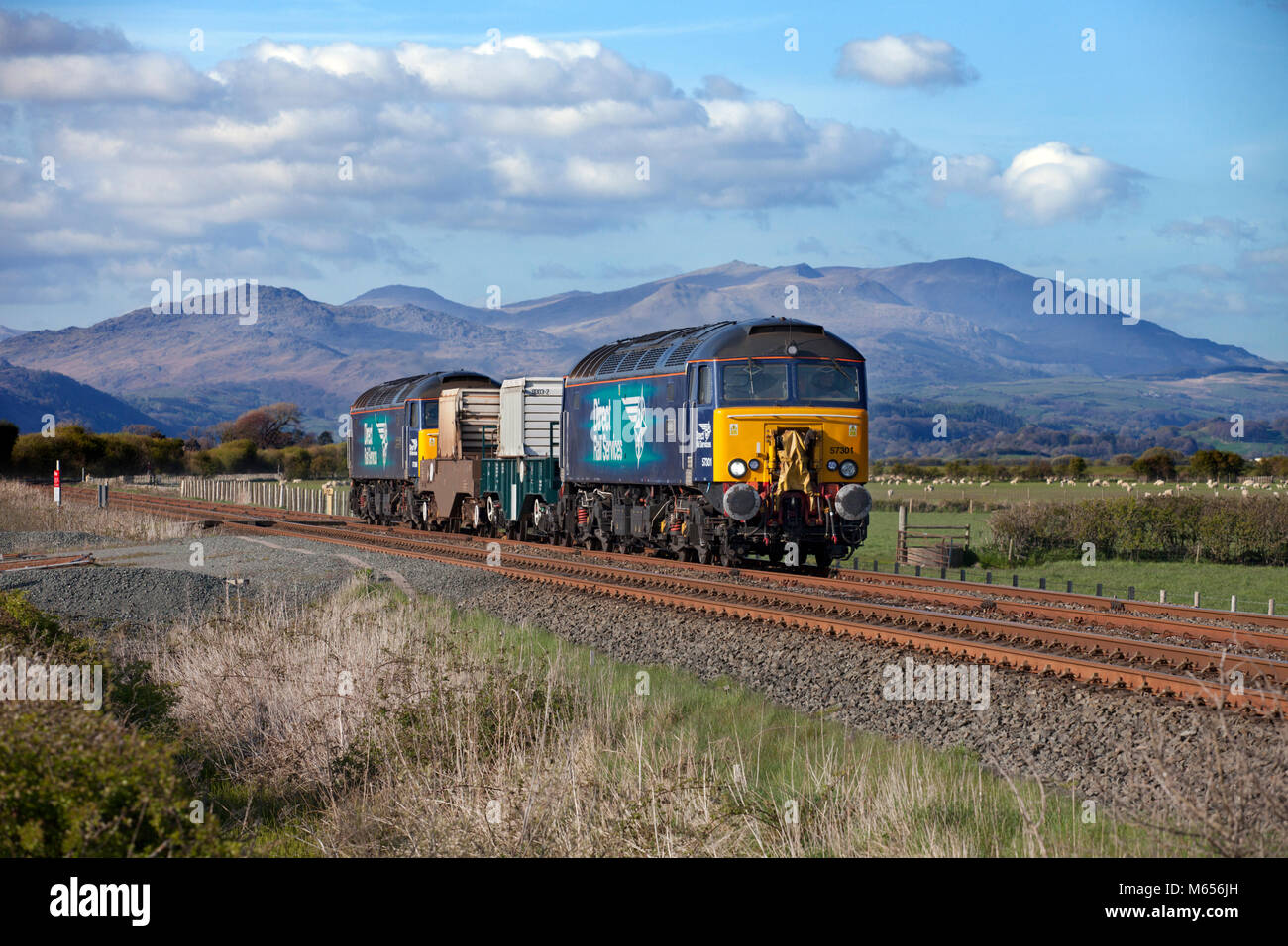 2 Direct rail Services class 57 locomotives pass Millom marsh, Cumbria ...