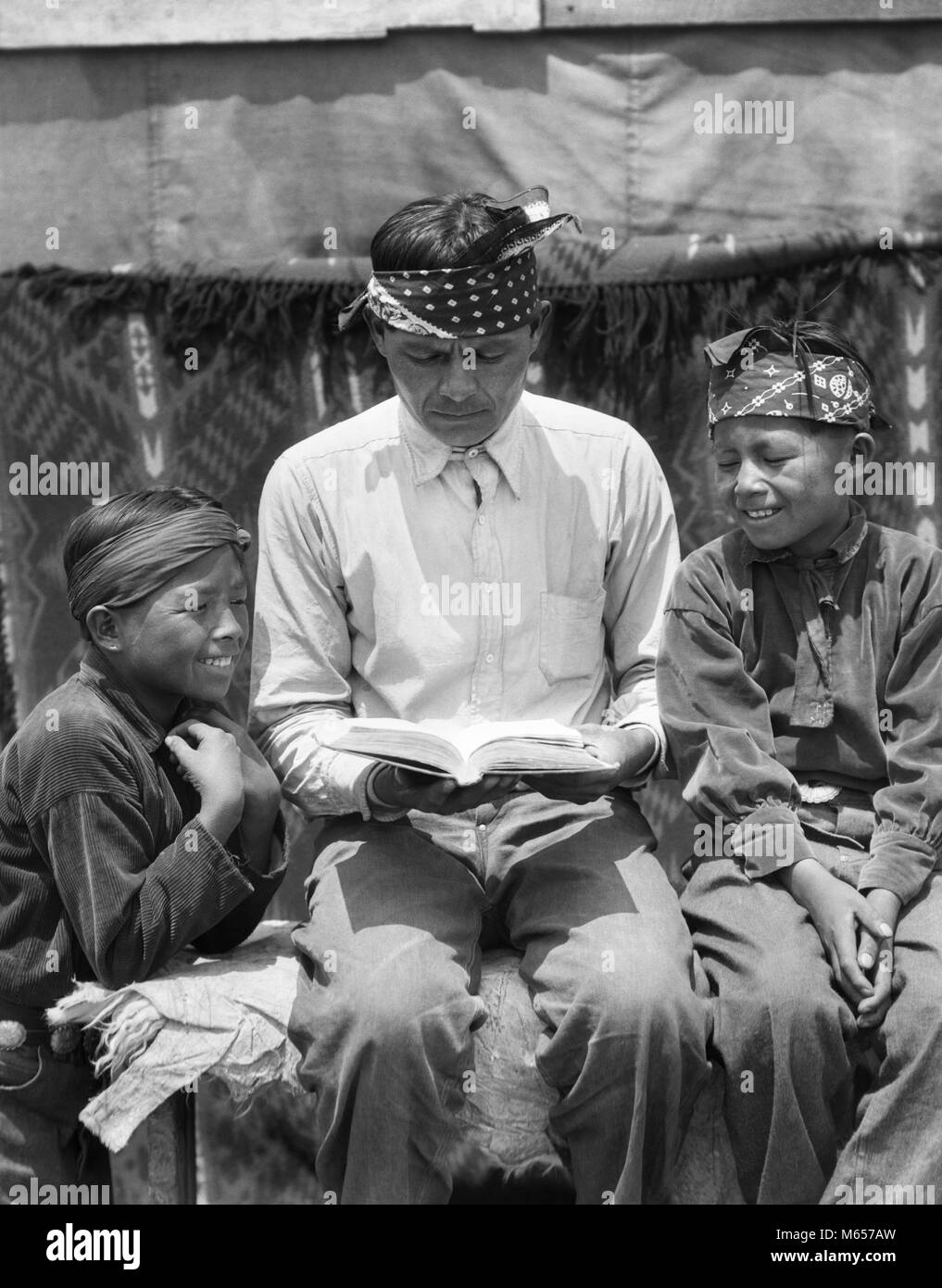 Boys read book Black and White Stock Photos & Images - Alamy