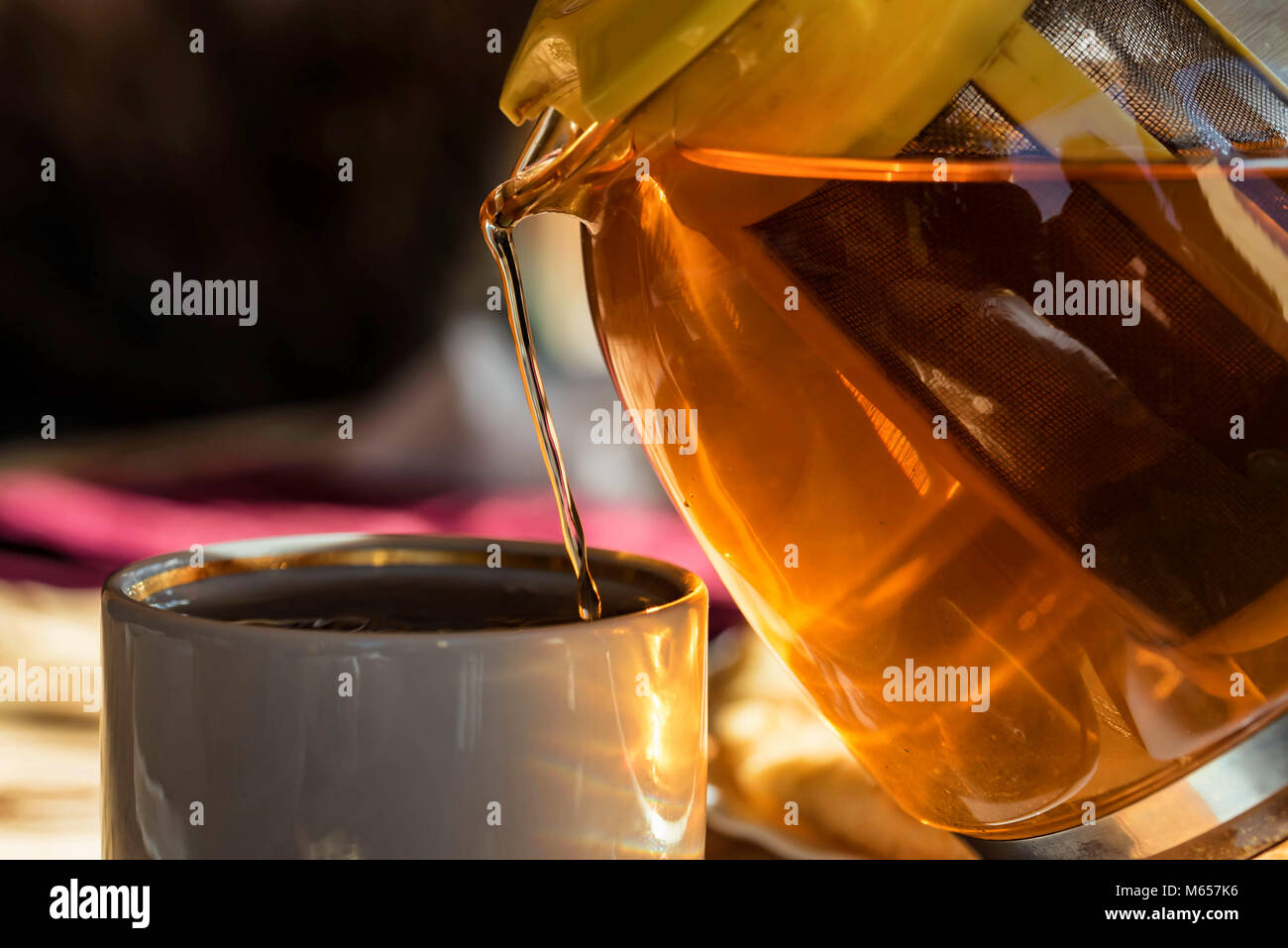 Pouring water from tea pot hi-res stock photography and images - Alamy