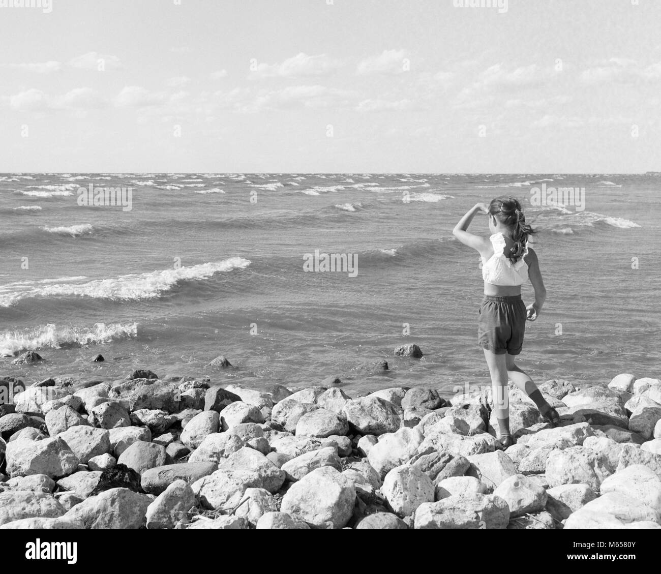 Little girl by sea Black and White Stock Photos & Images - Alamy