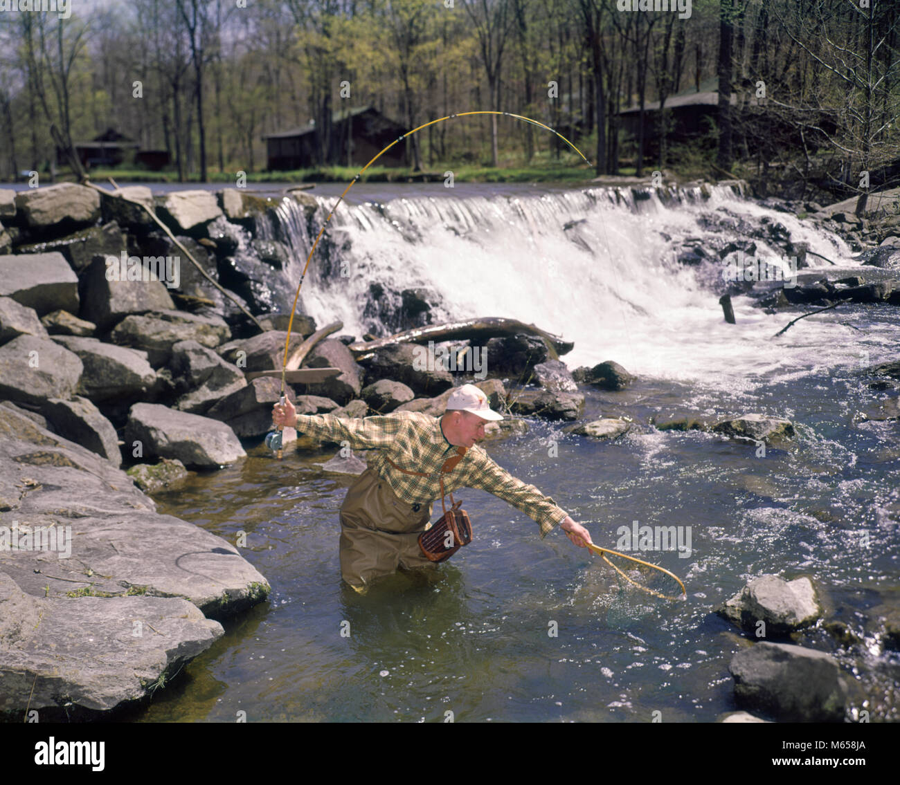 People fishing 1960s hi-res stock photography and images - Alamy