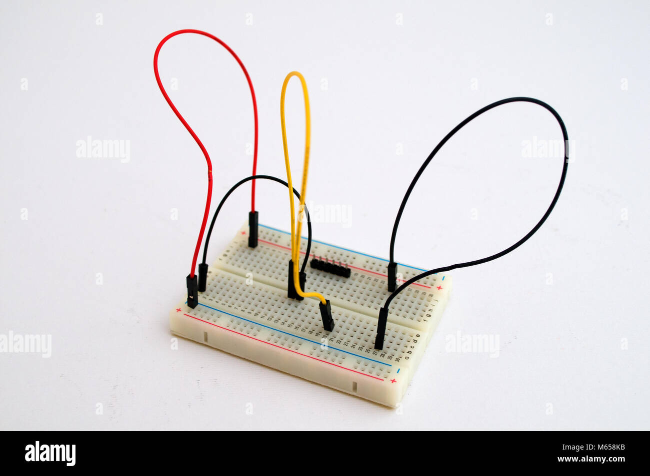 Connecting wires on a white board for connecting components Stock Photo ...