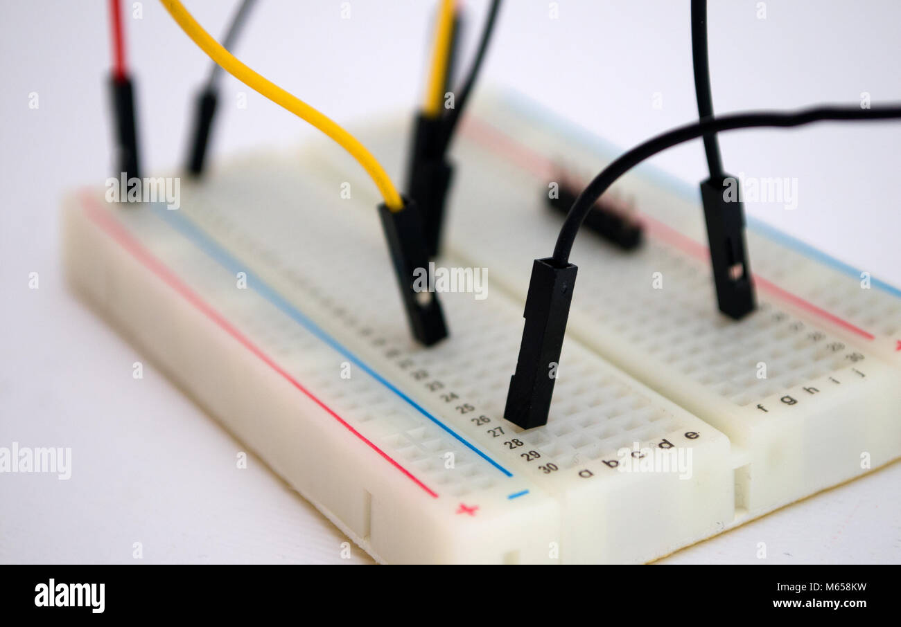 Connecting wires on a white board for connecting components Stock Photo ...