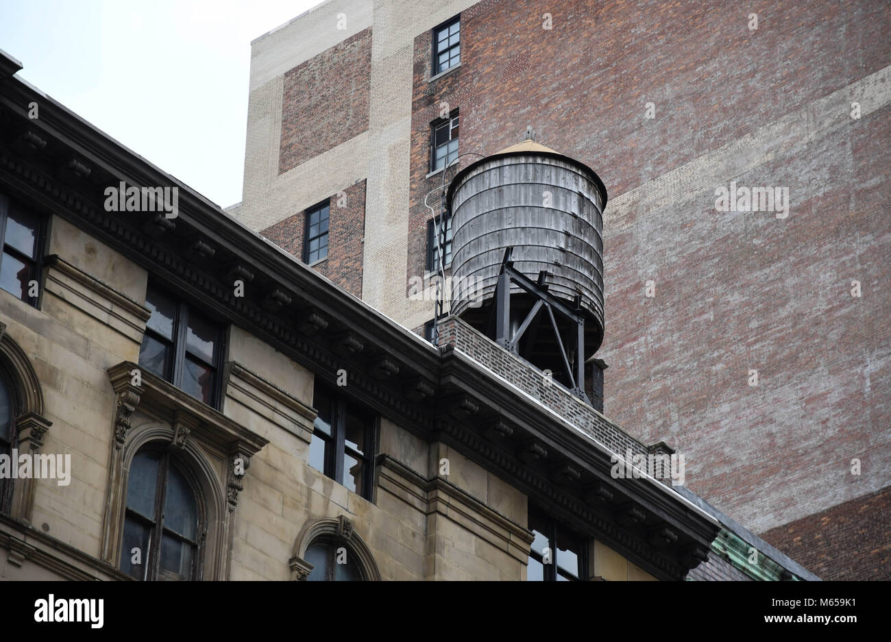 Old water storage tank atop a building in New York City, 24 Feb., 2018 ...