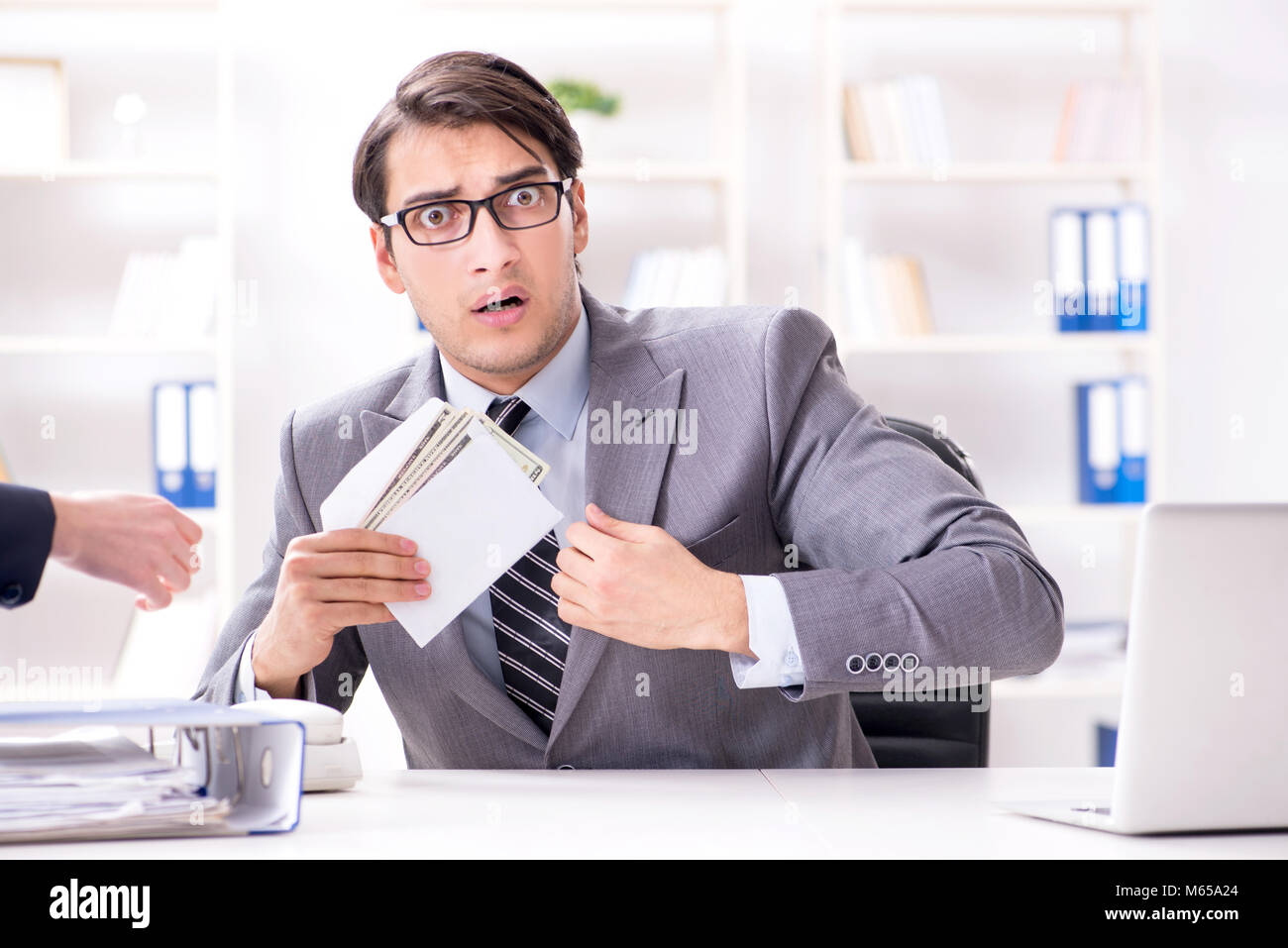Woman offering bribe businessman hi-res stock photography and images ...