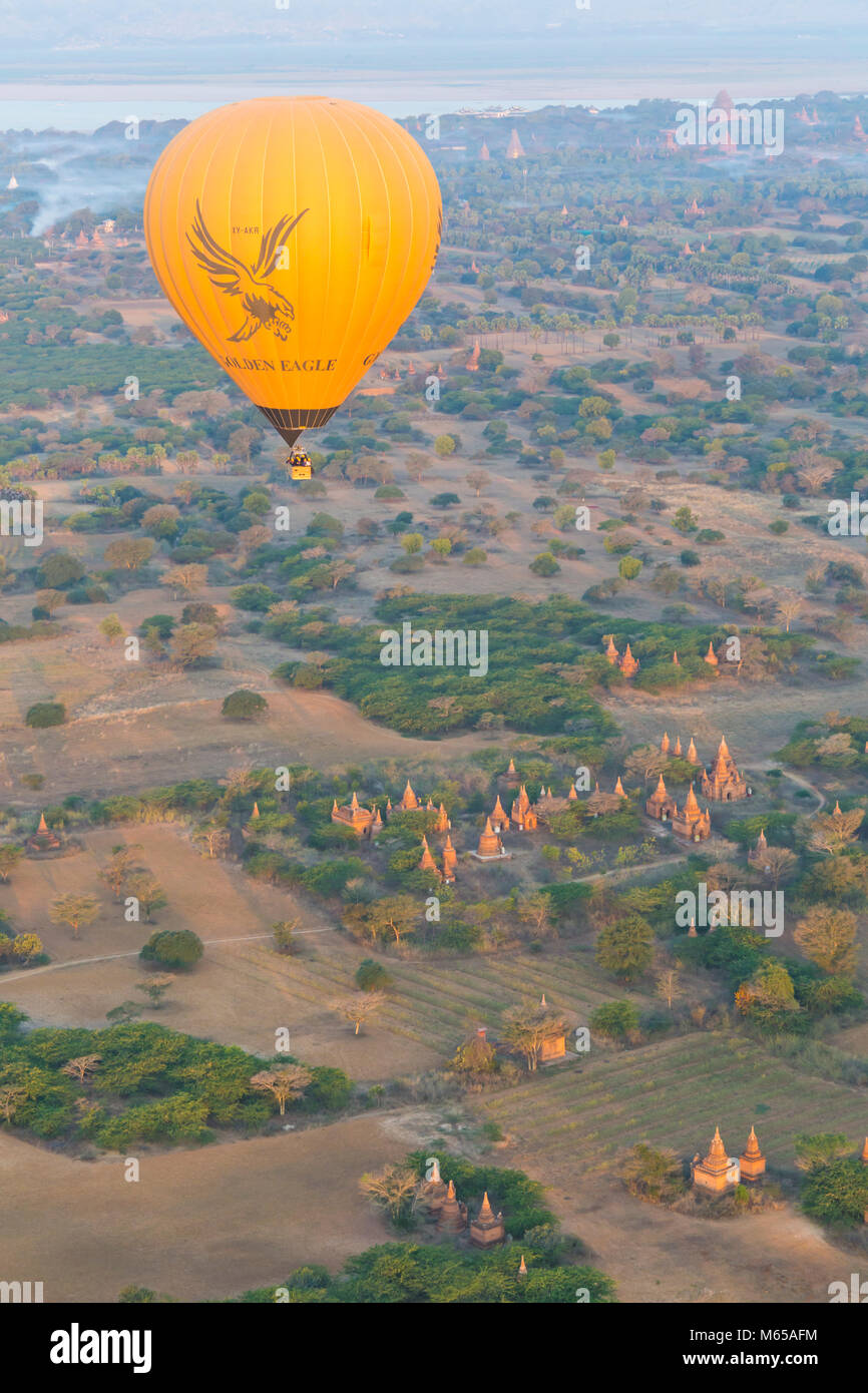 Hot air balloon flying over temples at Bagan at dawn, Myanmar (Burma ...