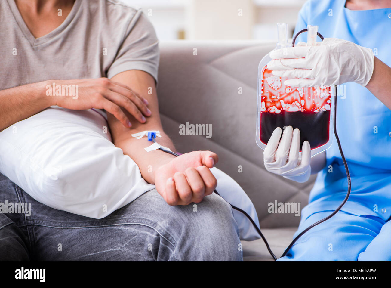 Patient getting blood transfusion in hospital clinic Stock Photo - Alamy