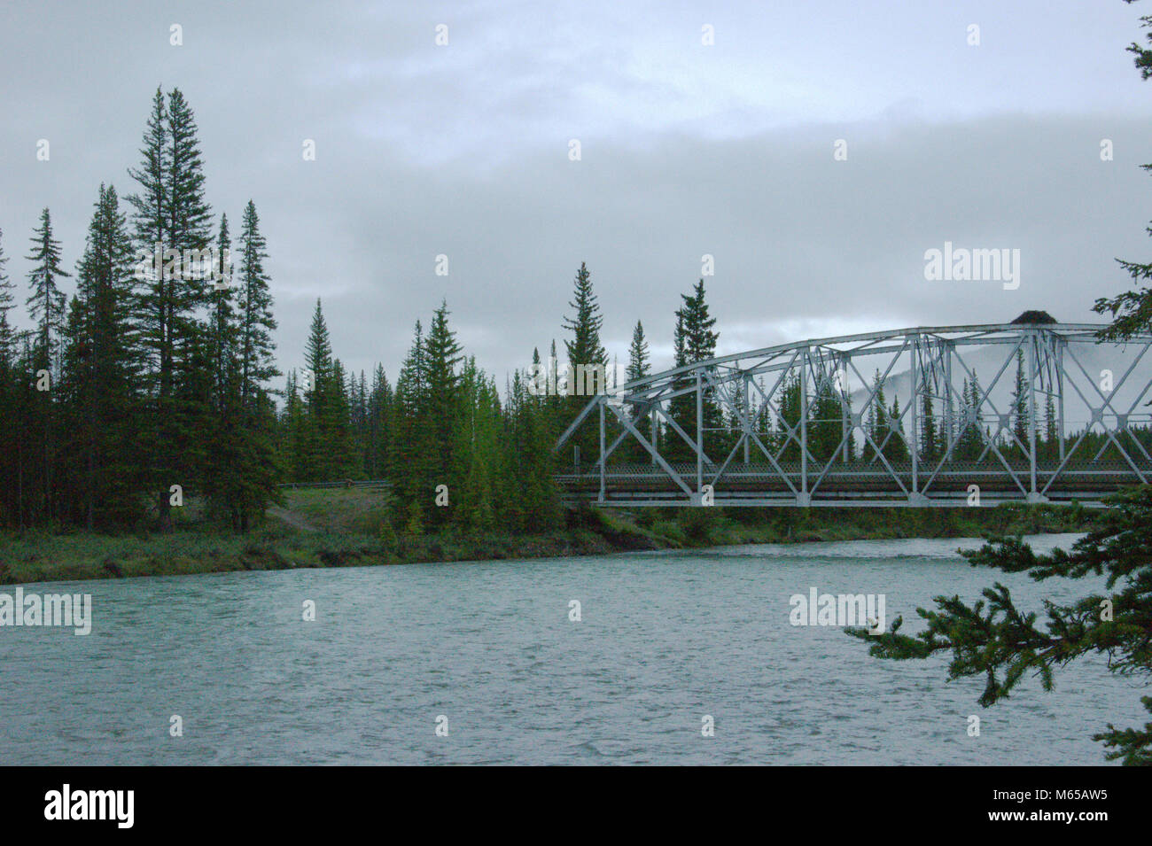 Steel bridge over a river Stock Photo - Alamy