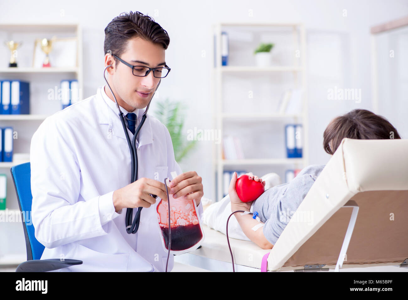 Patient getting blood transfusion in hospital clinic Stock Photo - Alamy