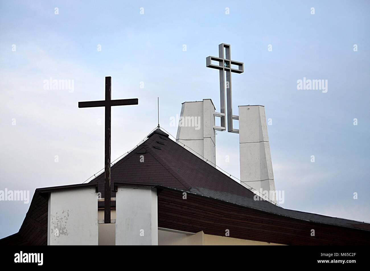 old cross and church Stock Photo - Alamy