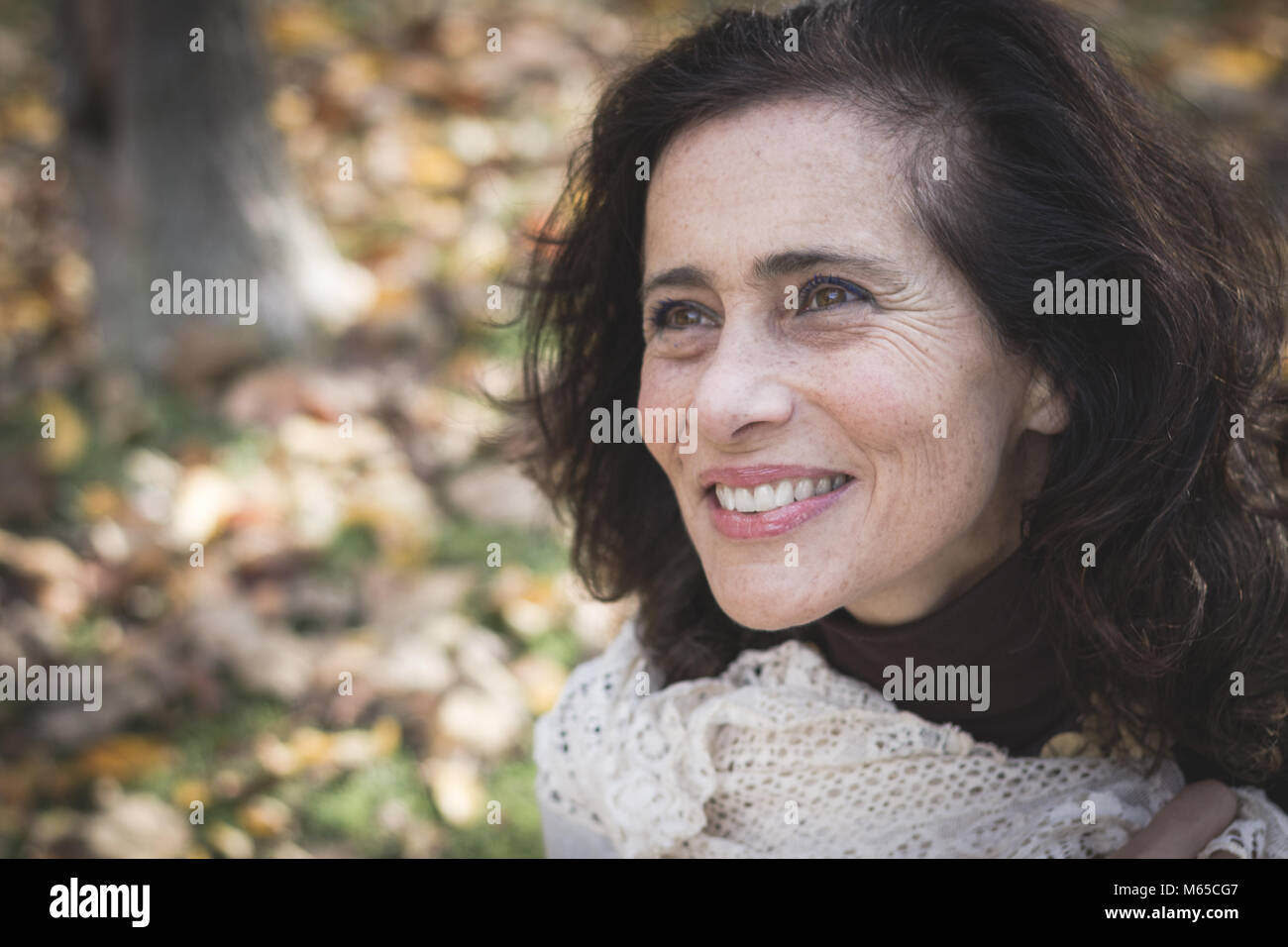 Skin care mature woman dark hair hi-res stock photography and images ...