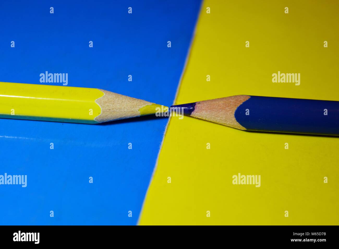 two wooden pens in color Stock Photo - Alamy