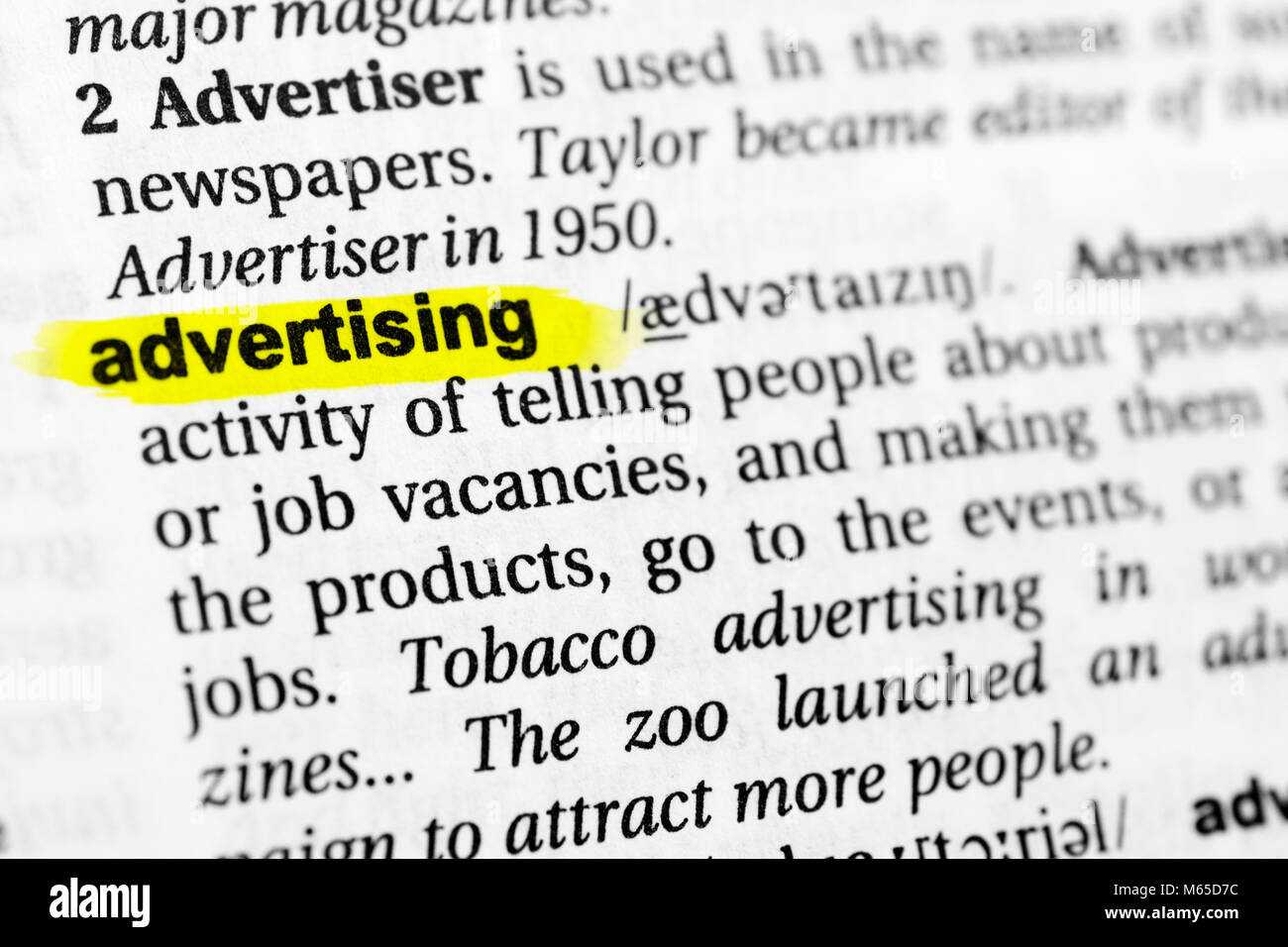 Highlighted English word "advertising" and its definition in the ...