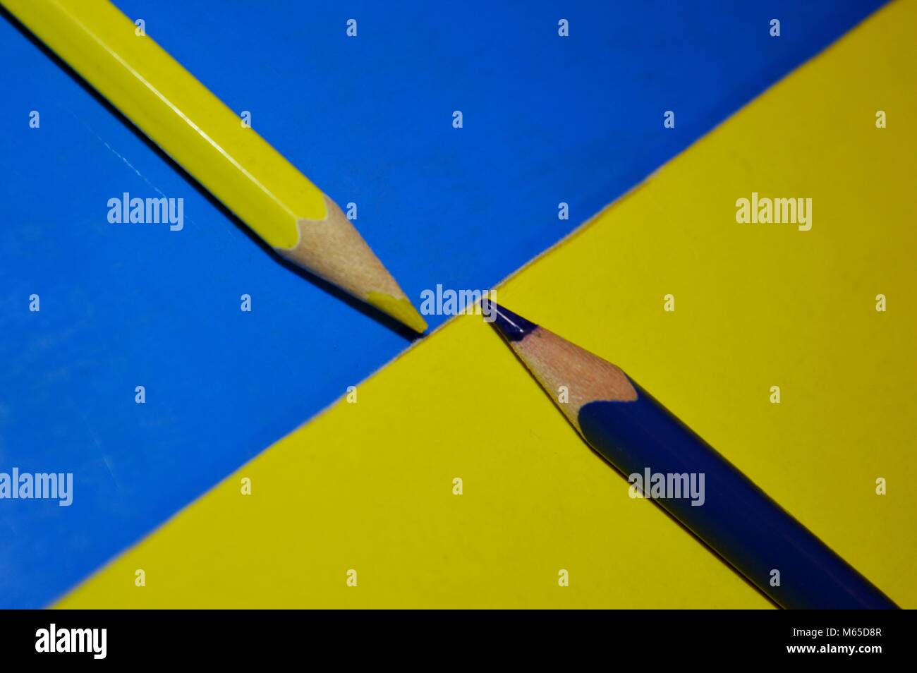 two wooden pens in color Stock Photo - Alamy