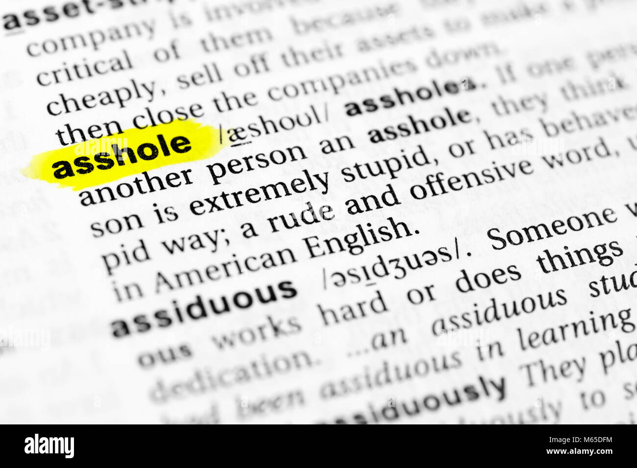 Highlighted English word "asshole" and its definition in the dictionary ...