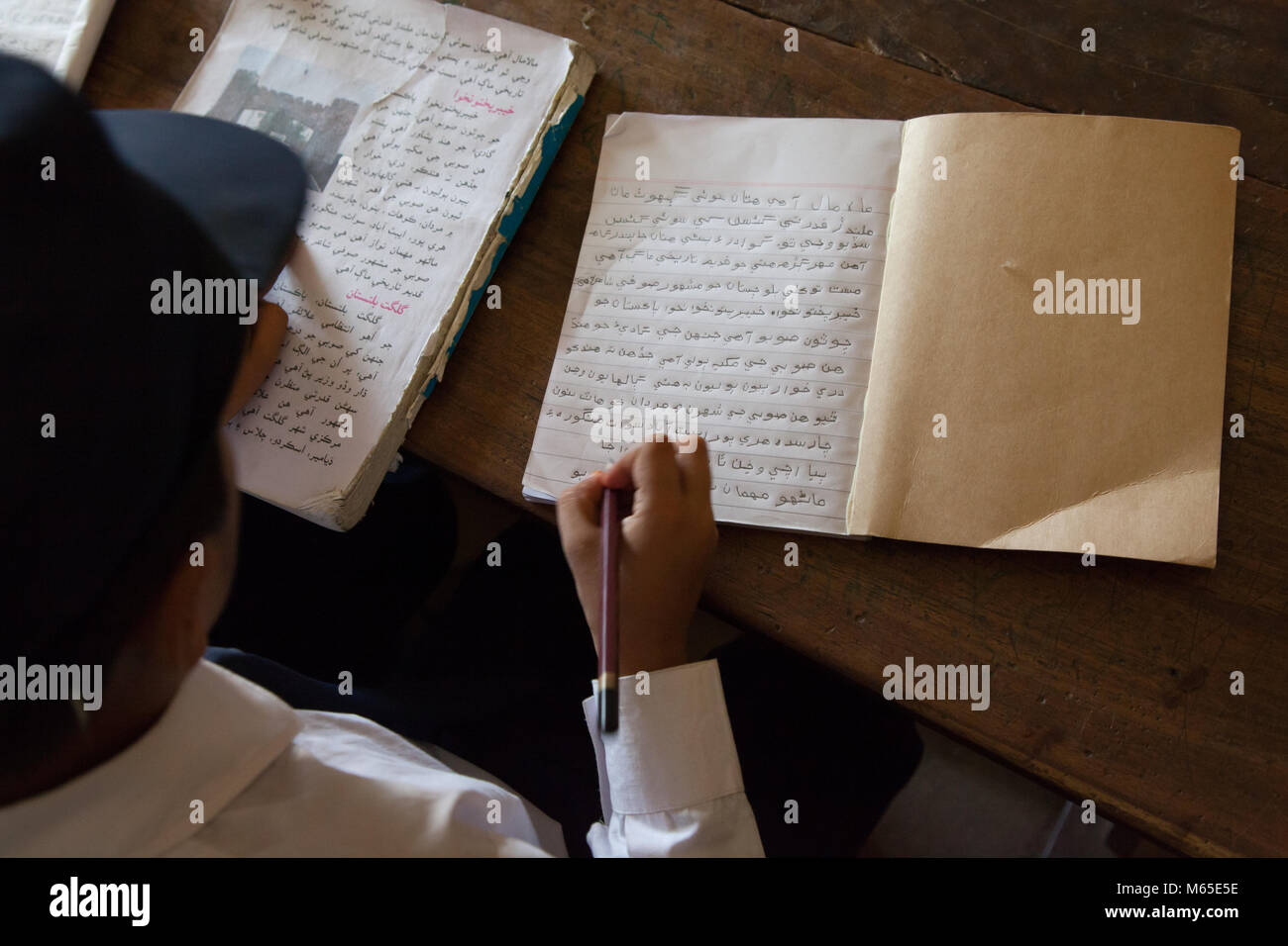 Boy writing, Education in Pakistani Government Schools Stock Photo - Alamy